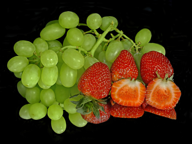 Green grapes and ripe strawberries on a black background wallpapers and ...